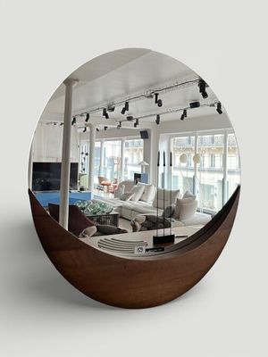 Large circular wall mirror, the lower part forming a half... - 85275719 ...