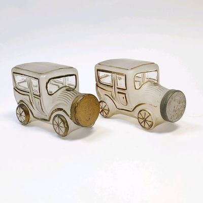 Old pair of bottles in the shape of a car from the beginn... - 84955911 ...