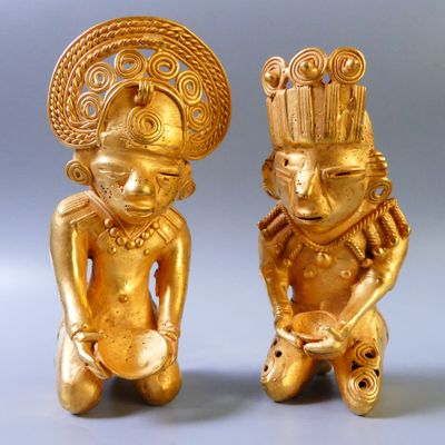 Colombia. Duo of kneeling shamans holding a precious met... - 84193298 ...