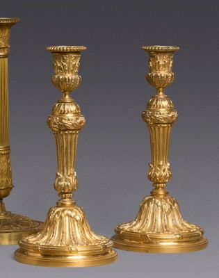 Paire de flambeaux en bronze ciselé et doré. Binet à godr... - 81514592 ...