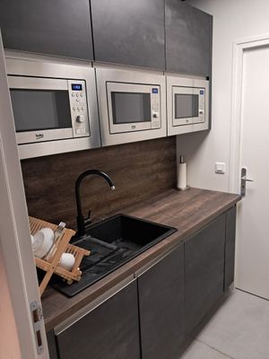 Small display kitchen in dark wood imitation melamine, co... - 84995394 ...