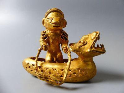 Colombia. Fisherman with a net in a pirogue with a jaguar... - 85099211 ...