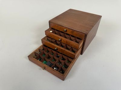 Small wooden case with four drawers and brass handles. T... - 79532687 ...