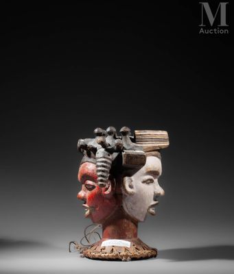 Warrior dance crest featuring a Janus head with two red a... - 78009590 ...