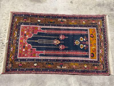 Rectangular hand-knotted wool rug decorated with stylised... - 85358129 ...